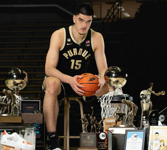 Zach Edey's Laid-Back Style: White Tee and Grey Sweatpants at Grizzlies ...