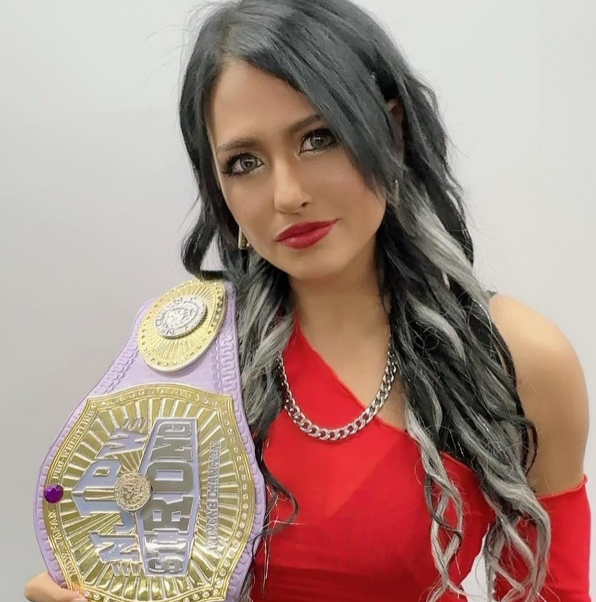 Giulia Beats Former WWE Champion in Stunning Debut, Prepares for Title Shot