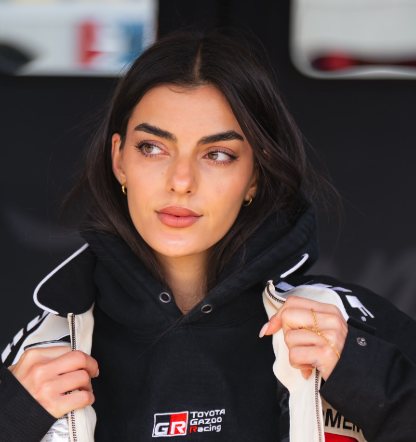 Toni Breidinger Turns Heads in Kansas with Bold Tank Top and Jorts Look